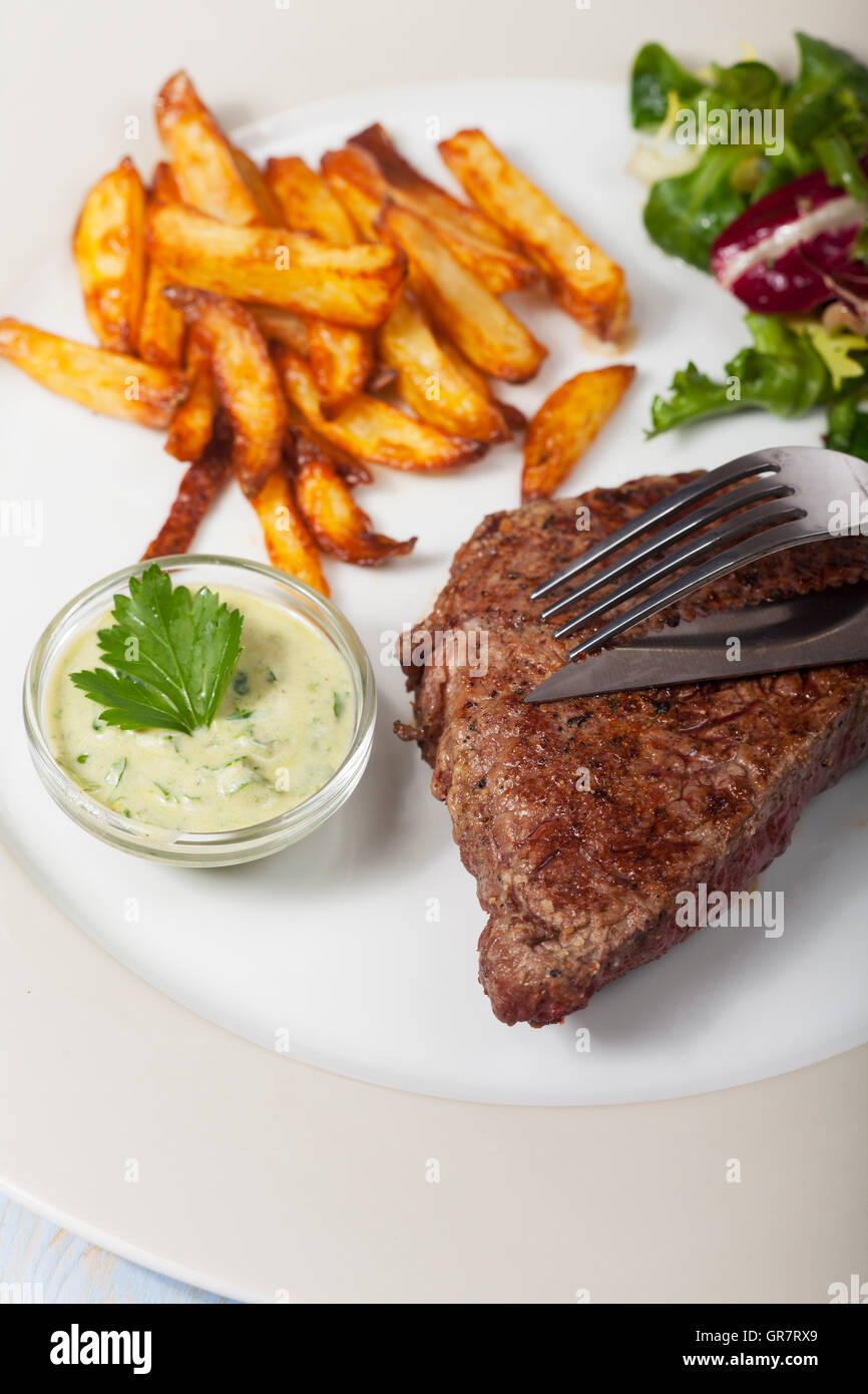 Steak With Fries Stock Photo - Alamy