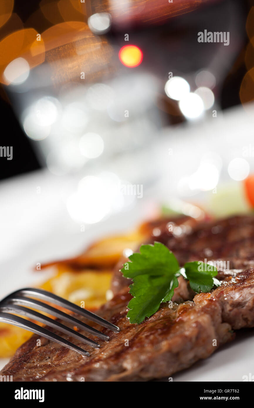 Fork On A Steak Stock Photo - Alamy