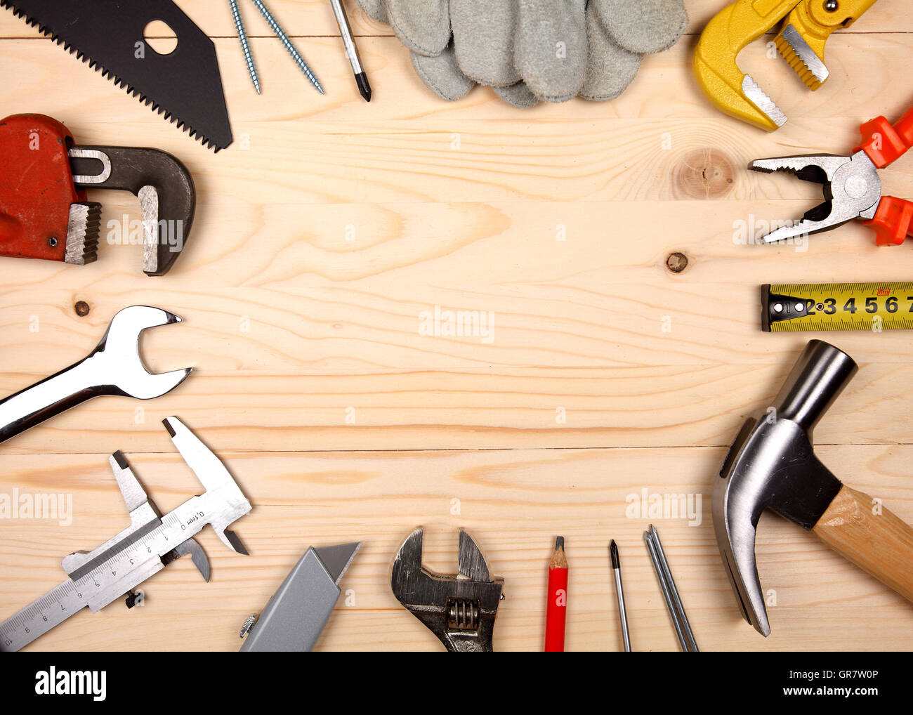 Set of plumbing and tools for sanitary engineering works on the wooden ...