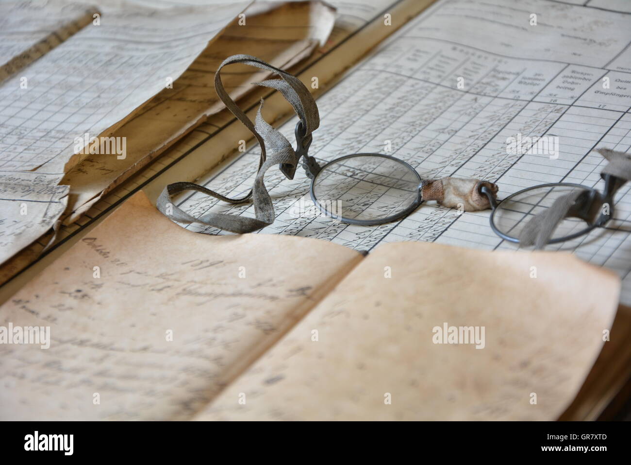 Hand written book with monocle hi-res stock photography and images - Alamy