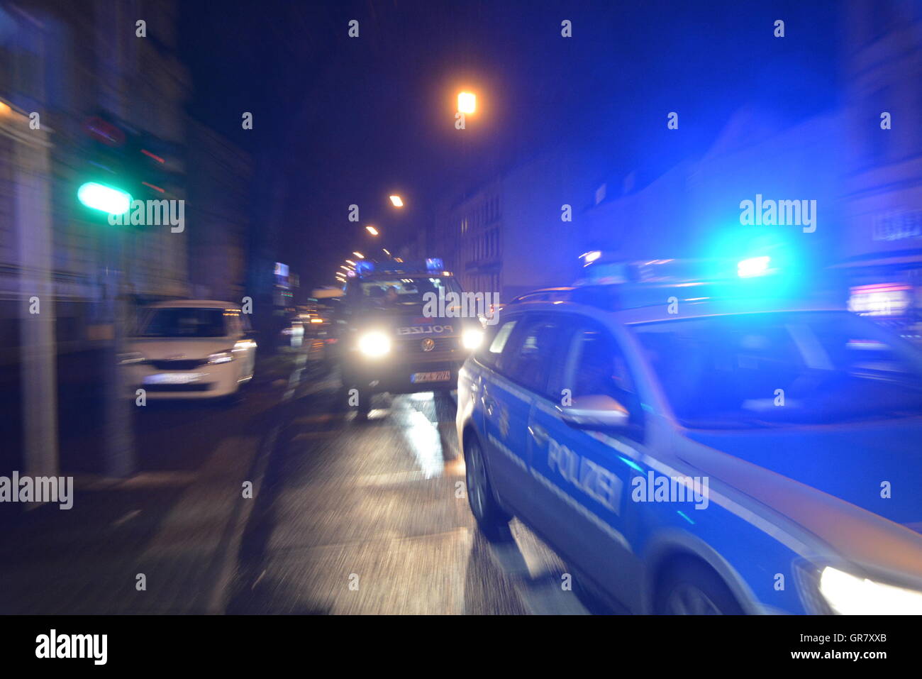 Police Car On The Street At Night Stock Photo - Alamy