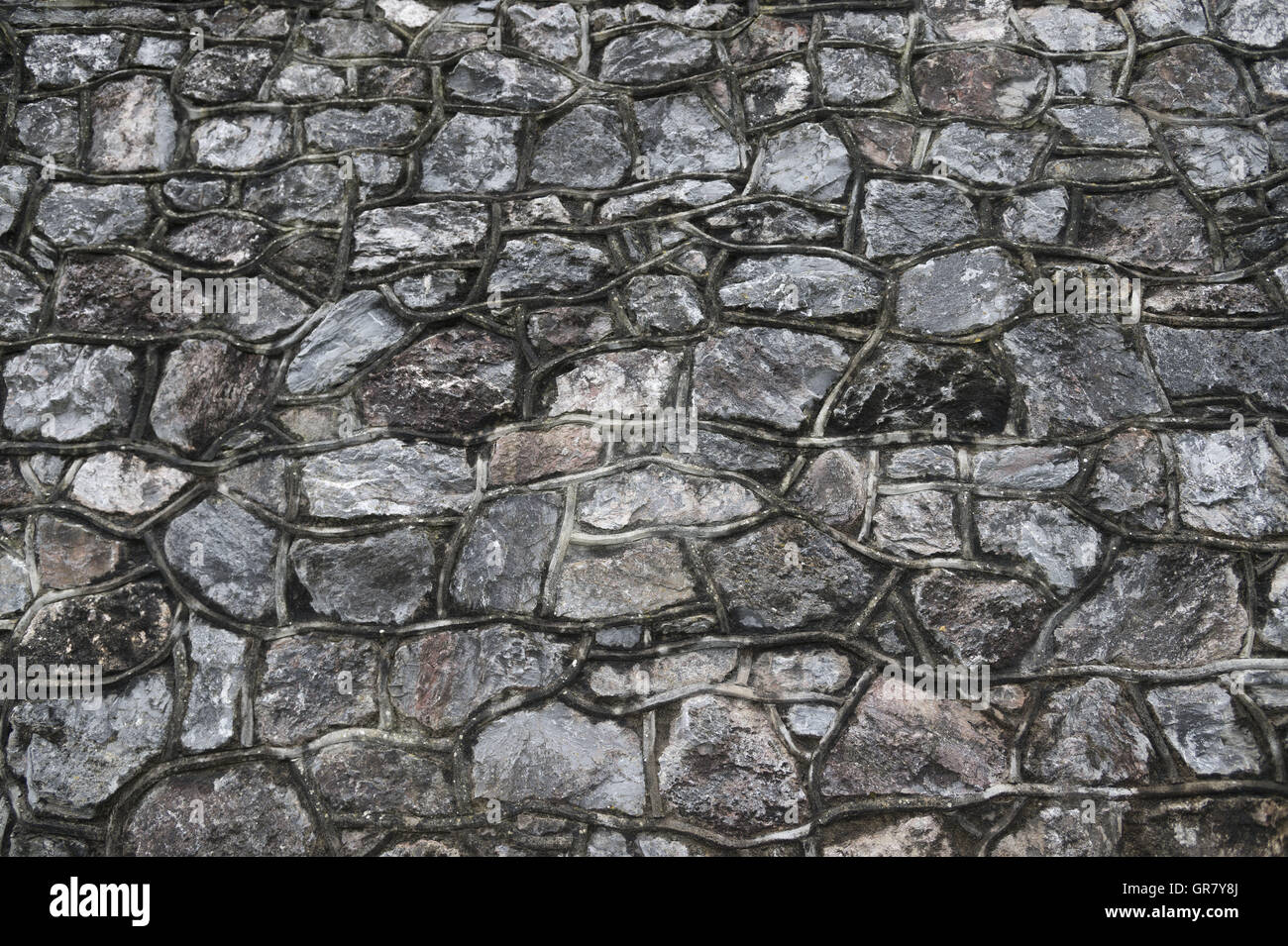 A Wall Of Gray Fieldstone Stock Photo - Alamy