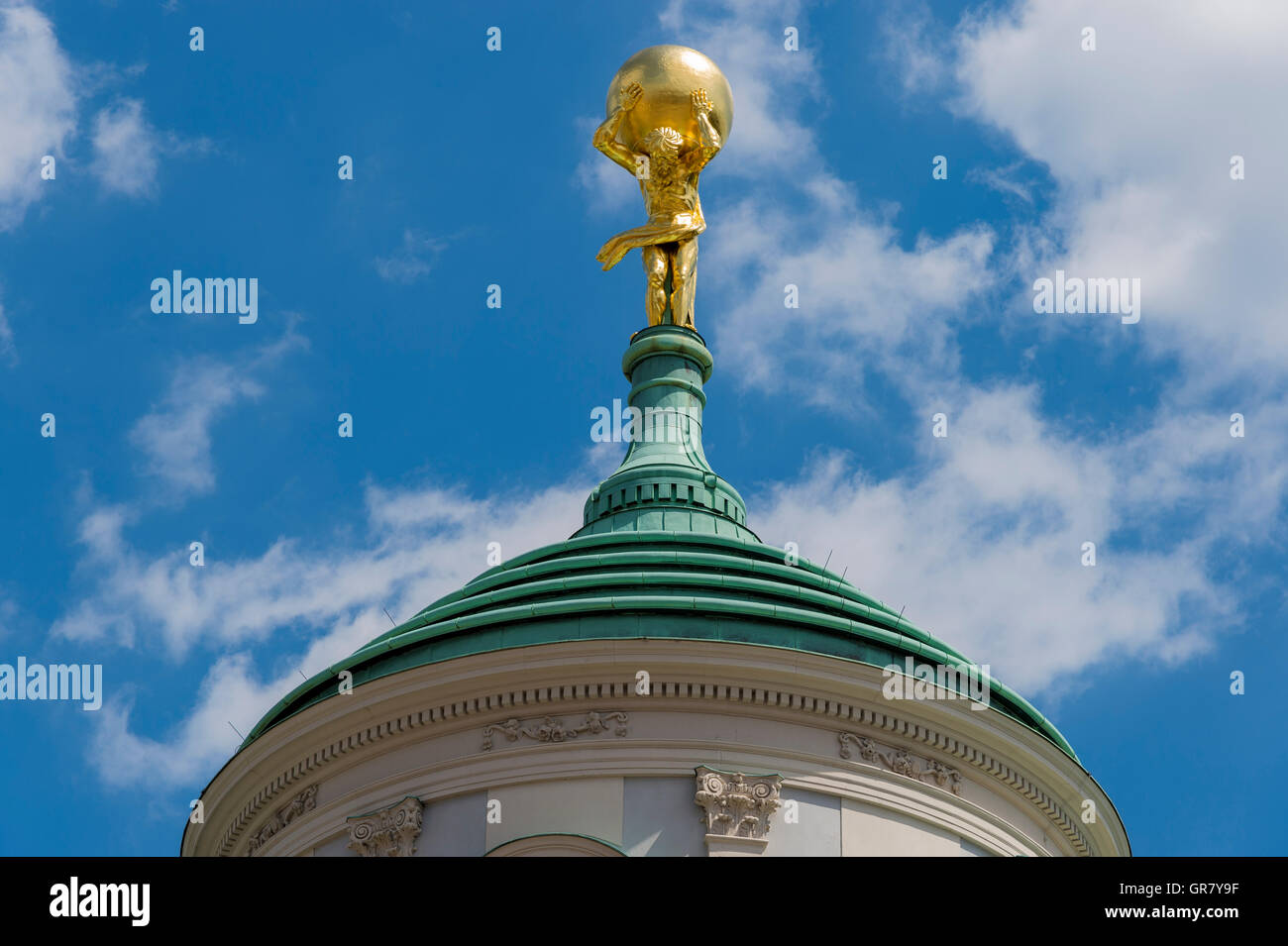 The Sculpture Of Atlas On The Spire Of The Old Town Hall. Germany ...