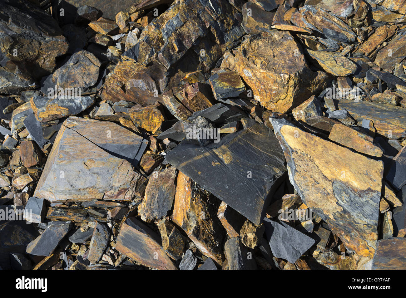Broken Rocks On The Coast Of The Irish Sea, Shale Stock Photo - Alamy