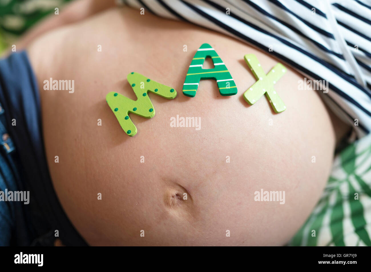 Baby Belly In 9Th Month With The Formed Wooden Letters Name The Child ...
