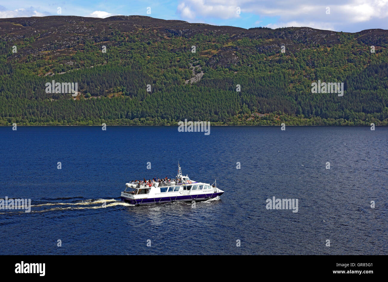 Scotland, boat with tourists on the Loch Ness Stock Photo - Alamy