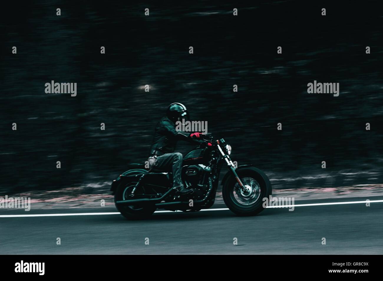 Biker riding hi-res stock photography and images - Alamy