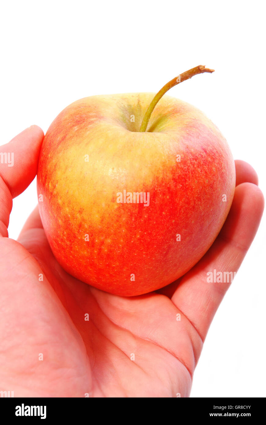 Apple In The Hand Stock Photo - Alamy