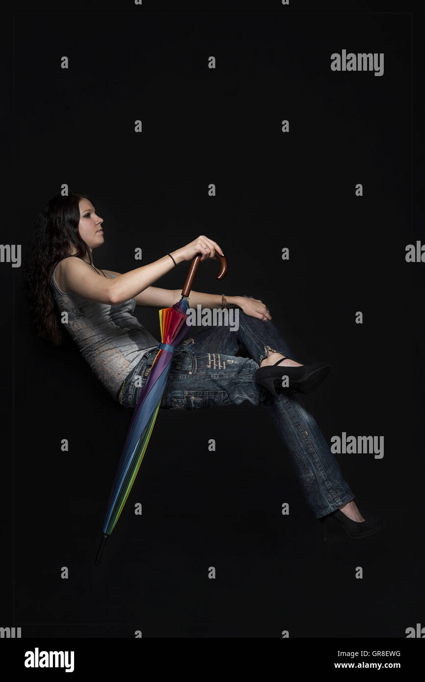 Levitation Shot Of A Young Woman Sitting In Limbo Stock Photo - Alamy