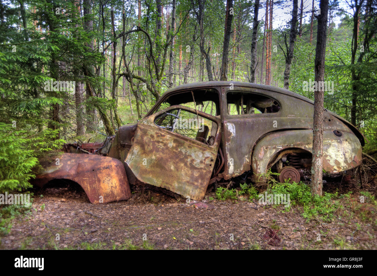 Car Dump Kirkö Mosse In Ryd, Sweden Stock Photo - Alamy