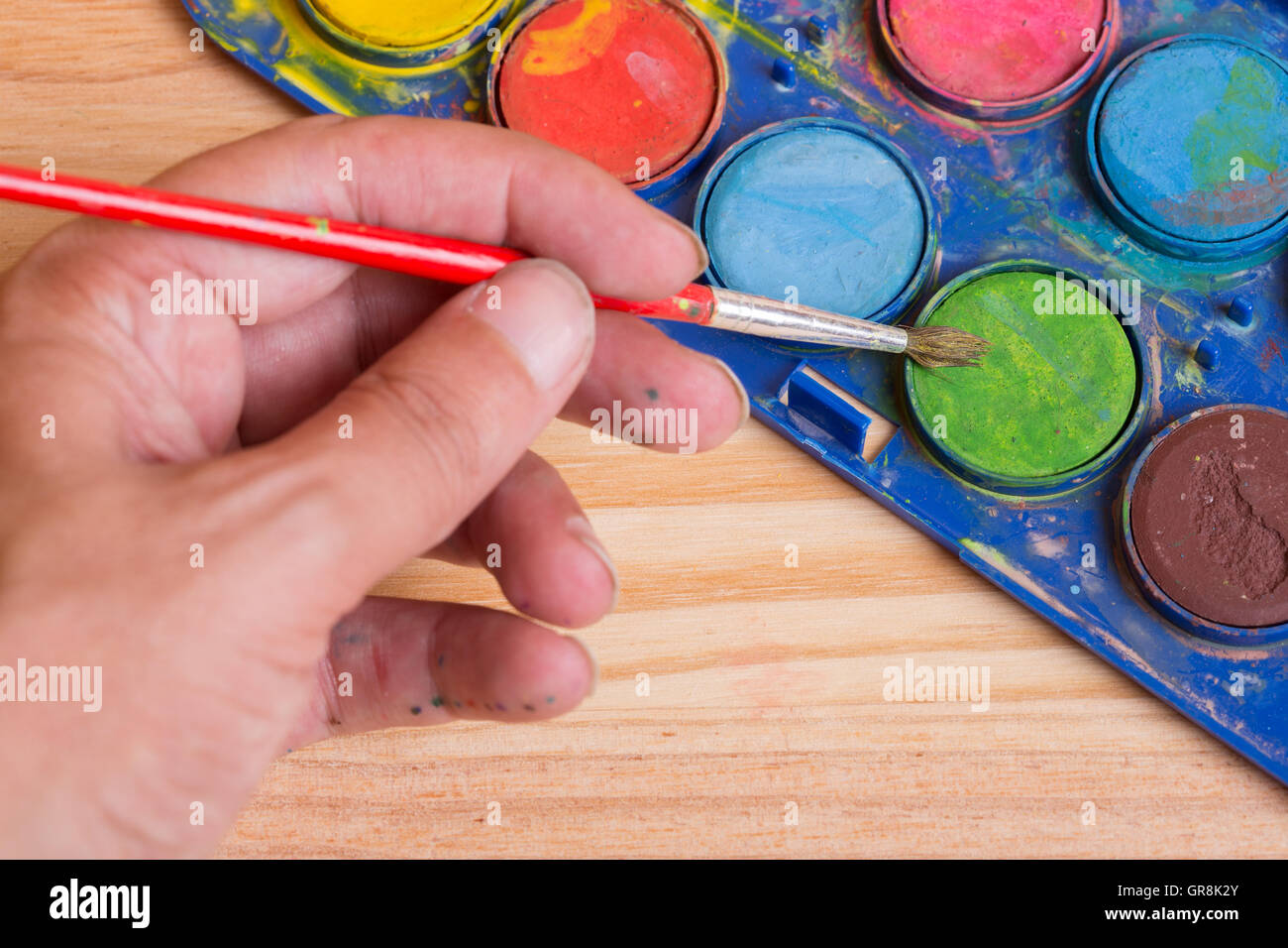 painter hand with paints, detail Stock Photo - Alamy