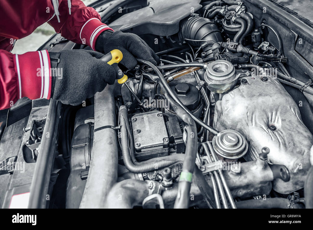 Car repair. Under the hood of the car. Toned photo Stock Photo - Alamy