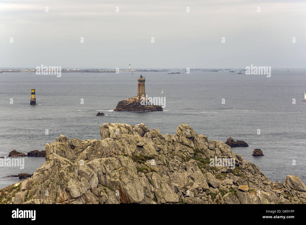 The Cliffs And Lighthouse From The Pointe Du Raz, Finistere, Brittany ...