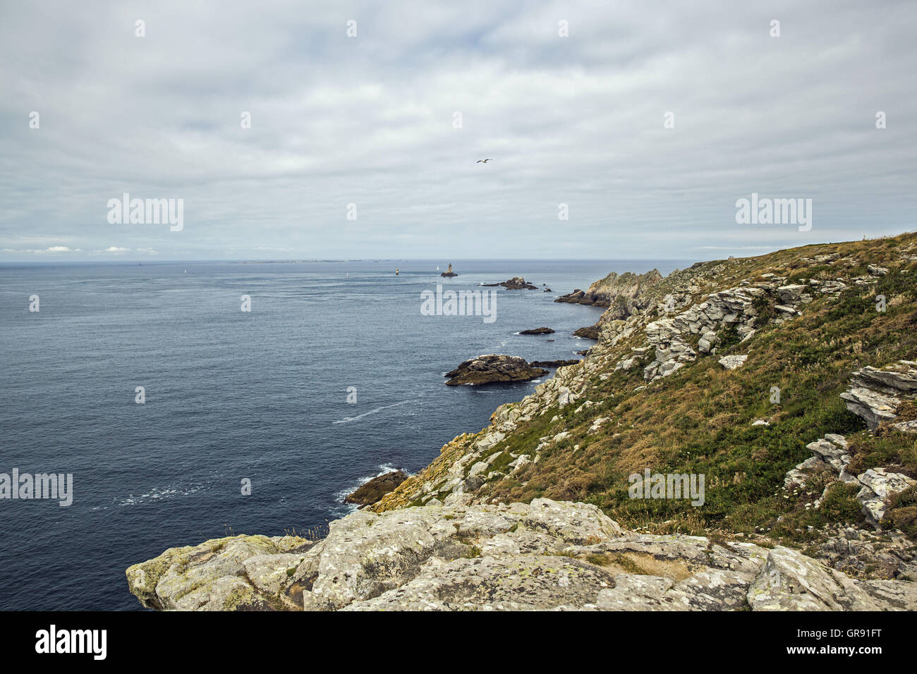 The Cliffs And Lighthouse From The Pointe Du Raz, Finistere, Brittany ...