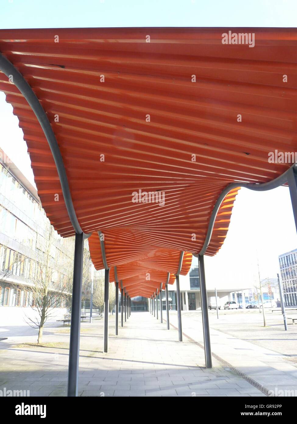 Narrow Pathway Along Pillars Stock Photo - Alamy