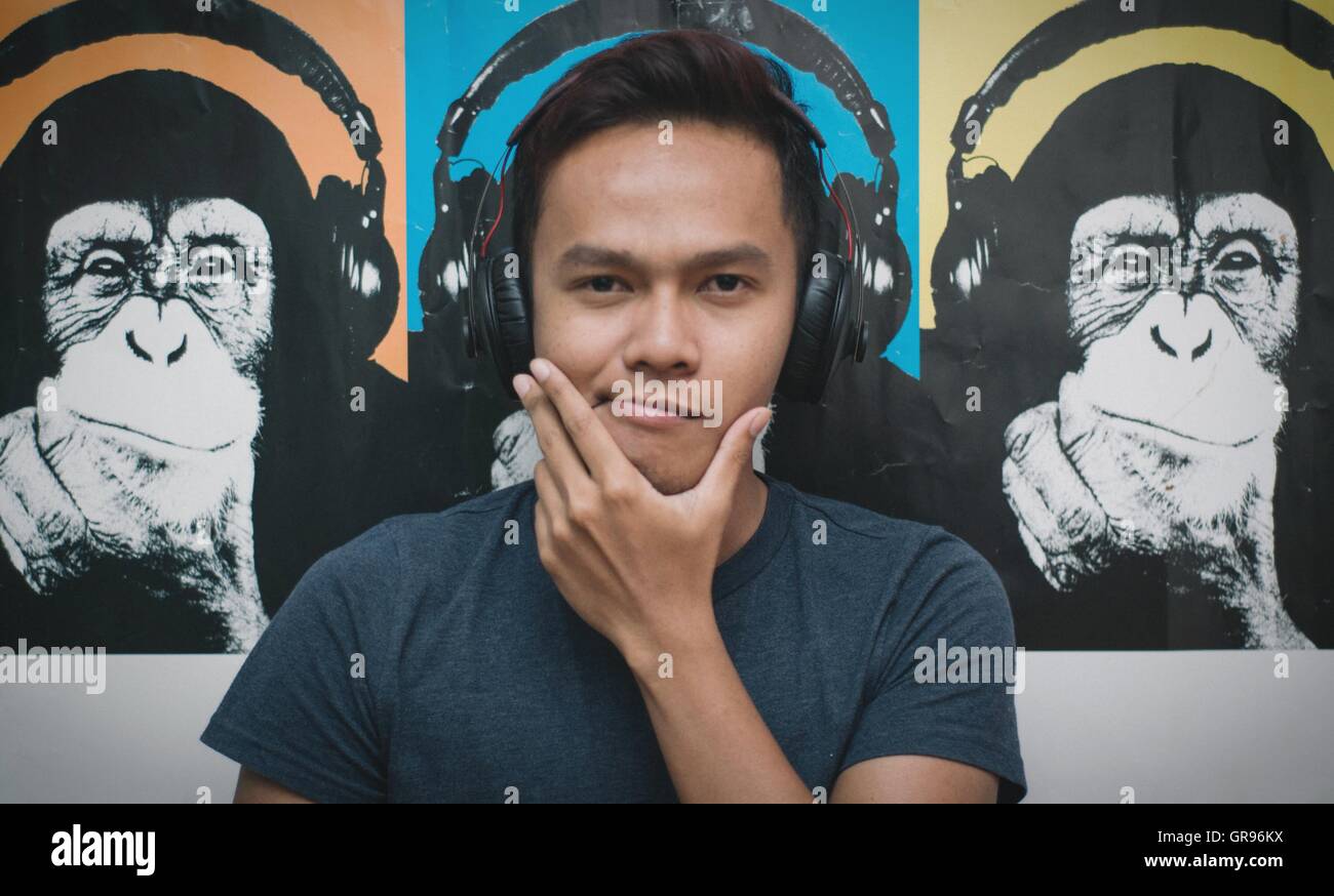 Monkey imitating human hi-res stock photography and images - Alamy