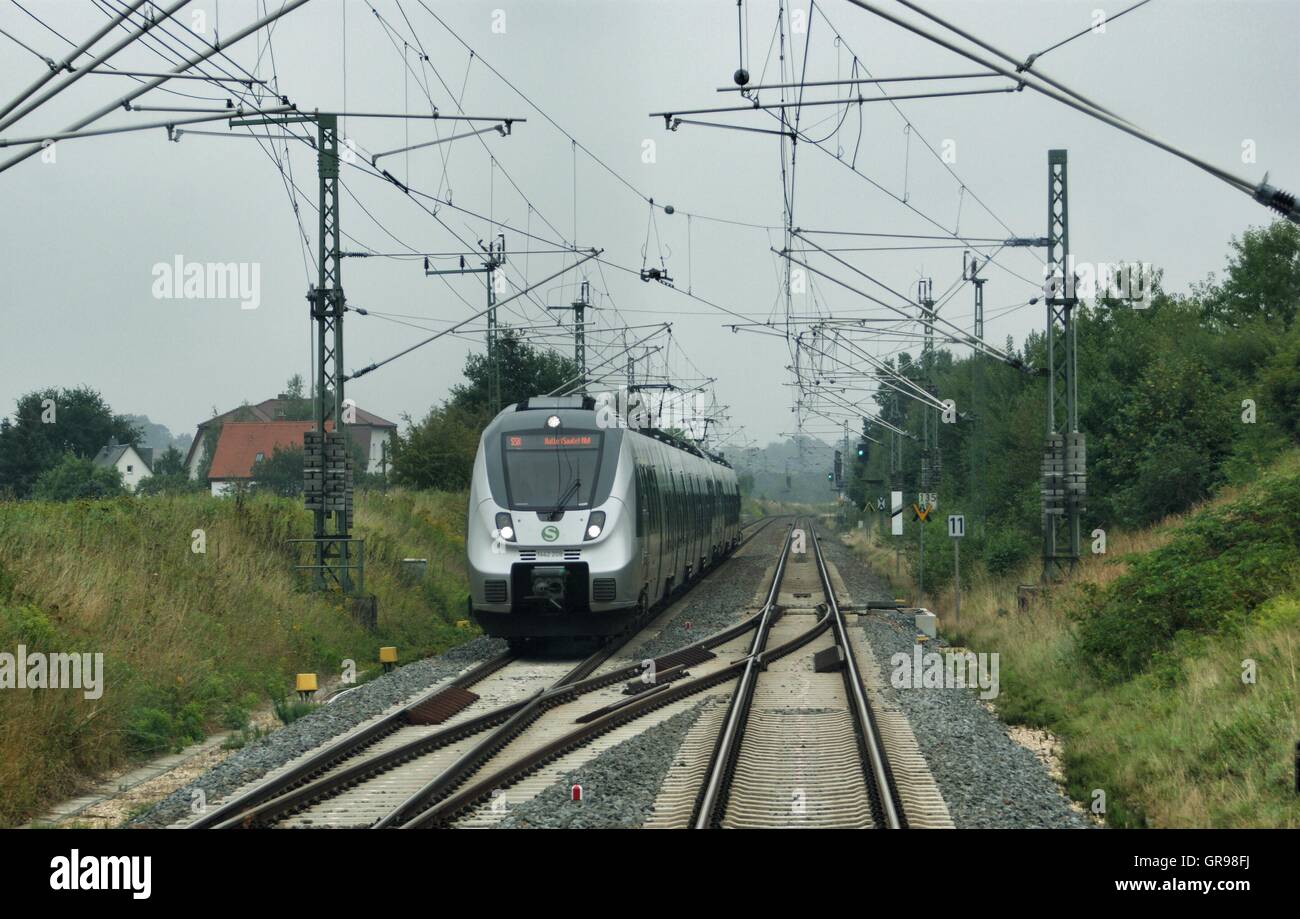Train moving forward on rail tracks hi-res stock photography and images ...