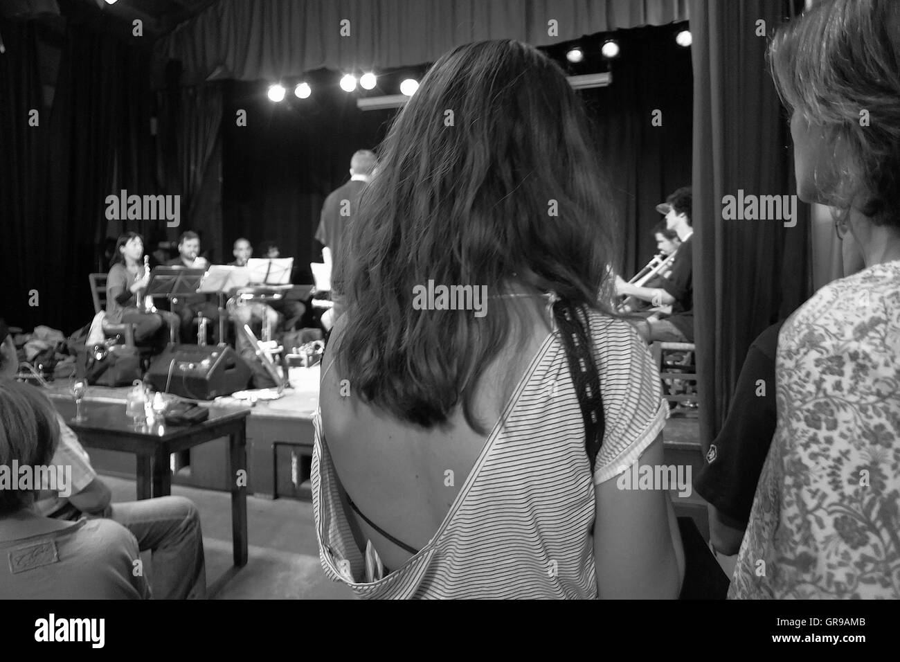Rear View Of Women Enjoying Music Concert Stock Photo - Alamy