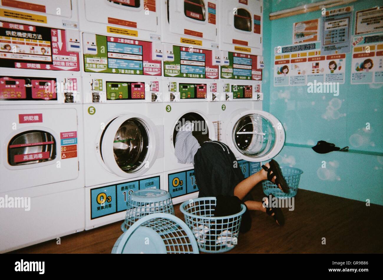Woman inside washing machine hi-res stock photography and images - Alamy