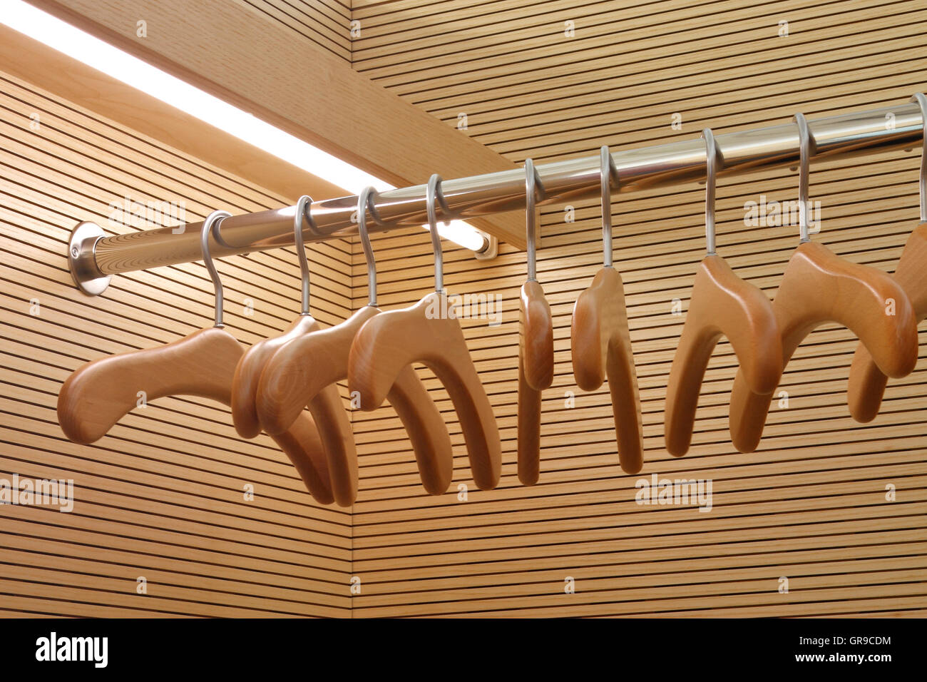 Wardrobe With Hangers Stock Photo - Alamy