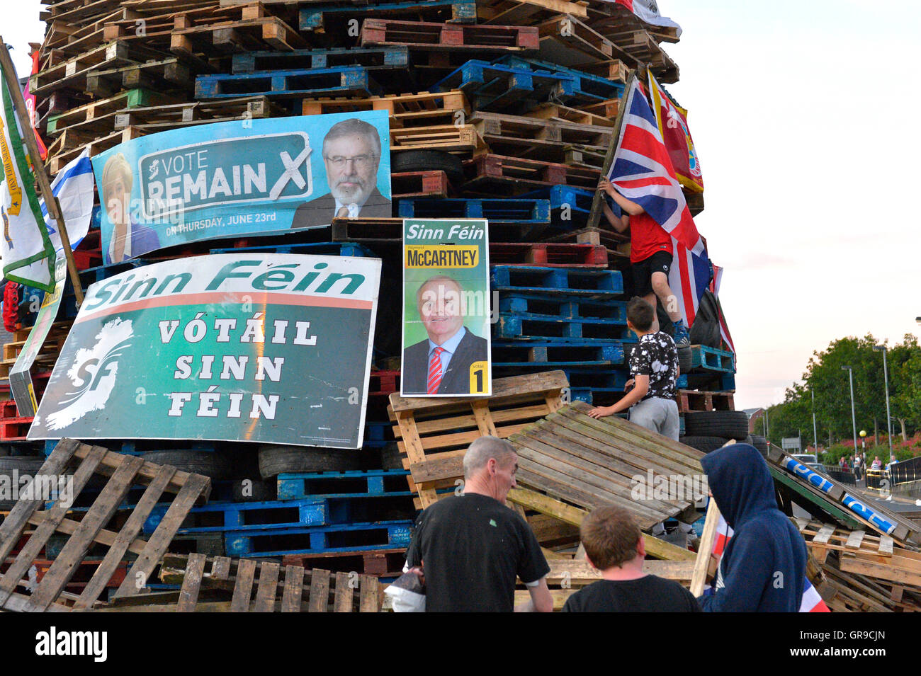 Republican election posters and a Union Jack flag on bonfire in Derry’s ...