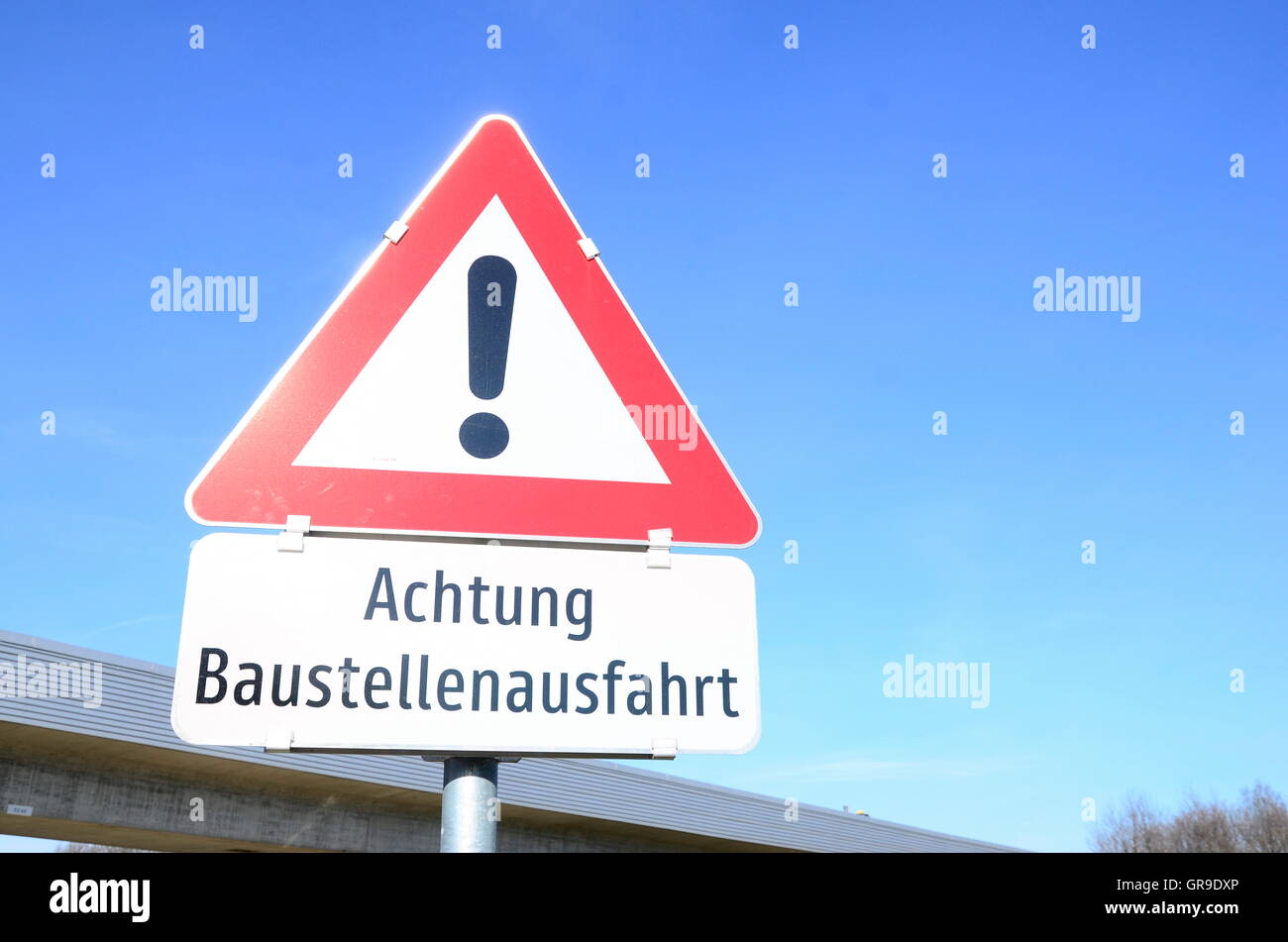 Sign, Attention Site Exit Stock Photo - Alamy