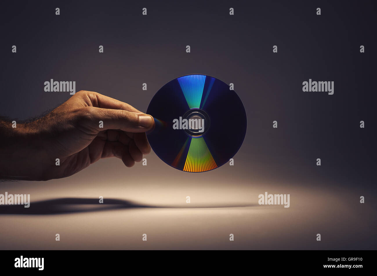 Hand holding cd hi-res stock photography and images - Alamy