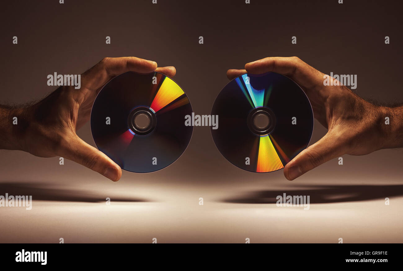 Hand holding cd hi-res stock photography and images - Alamy