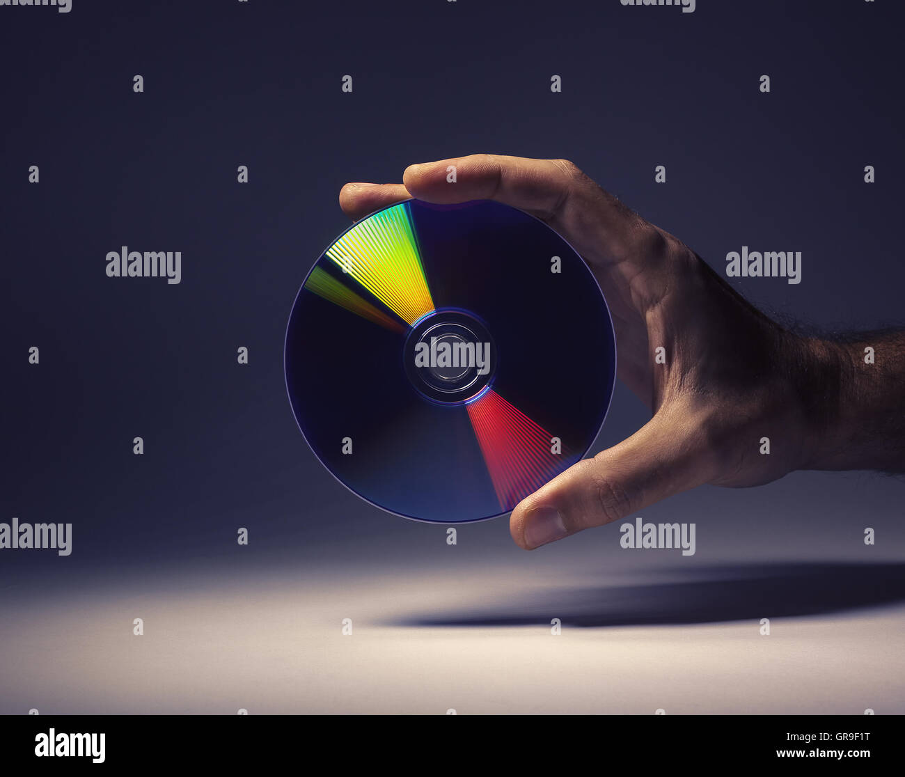 Hand holding cd hi-res stock photography and images - Alamy