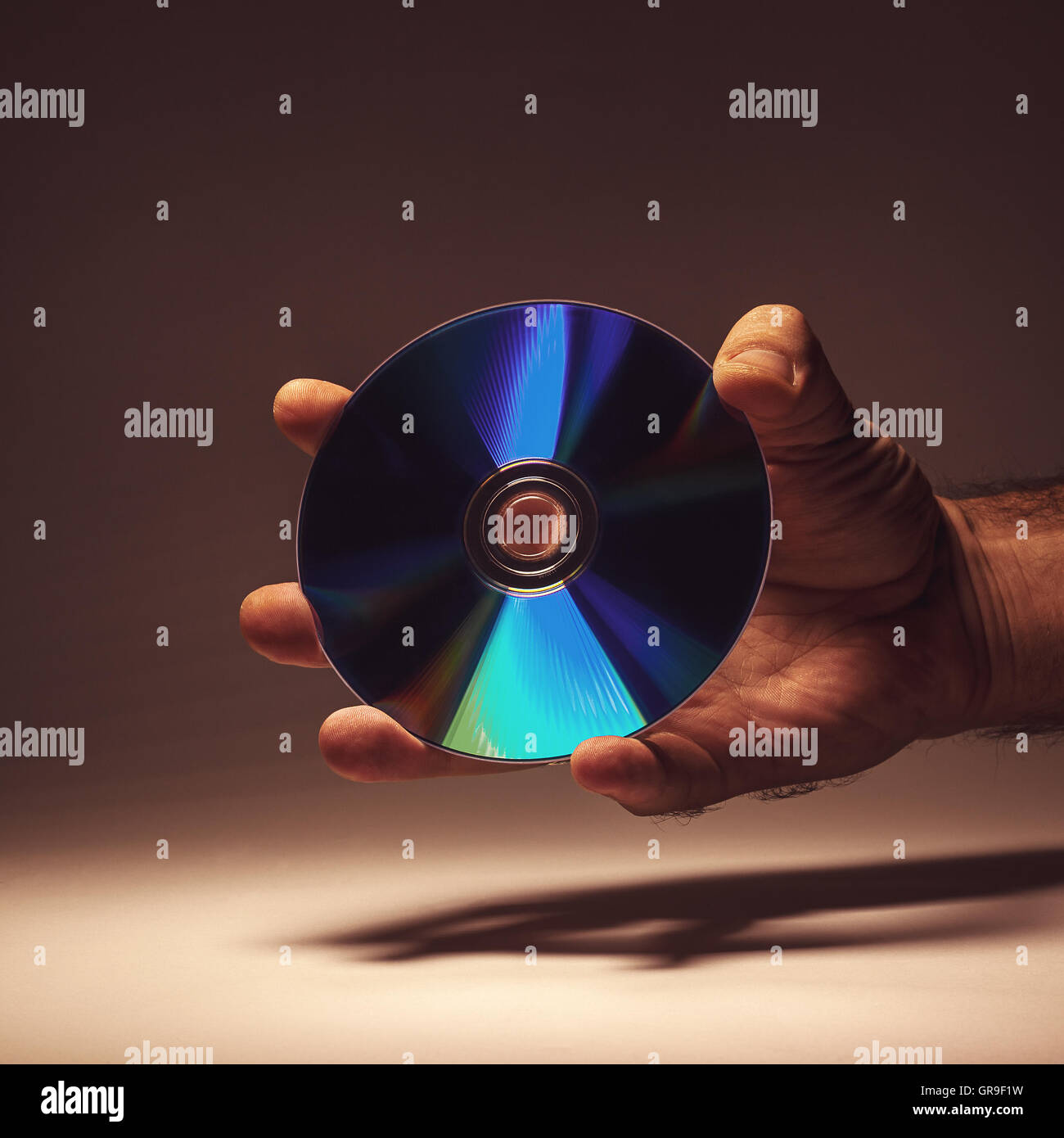 Hand holding cd hi-res stock photography and images - Alamy