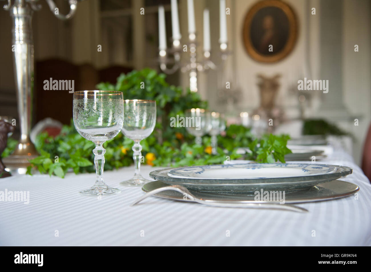 Historically Laid Table In A Dining Room Stock Photo - Alamy