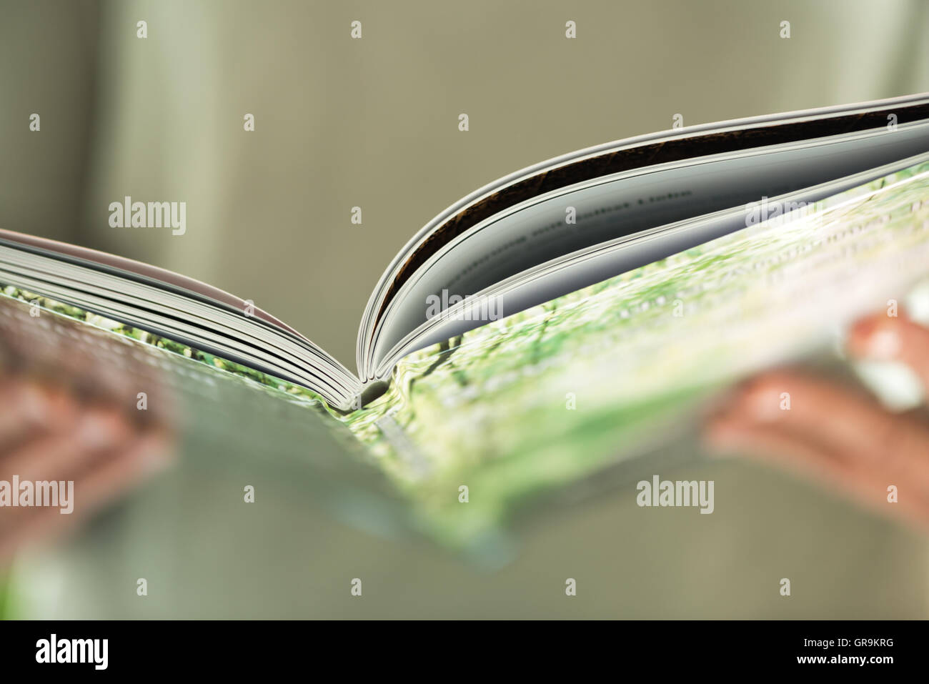 Open Hardcover Book With Hands Stock Photo - Alamy Open Hardcover Book With Hands Stock Photo - Alamy
