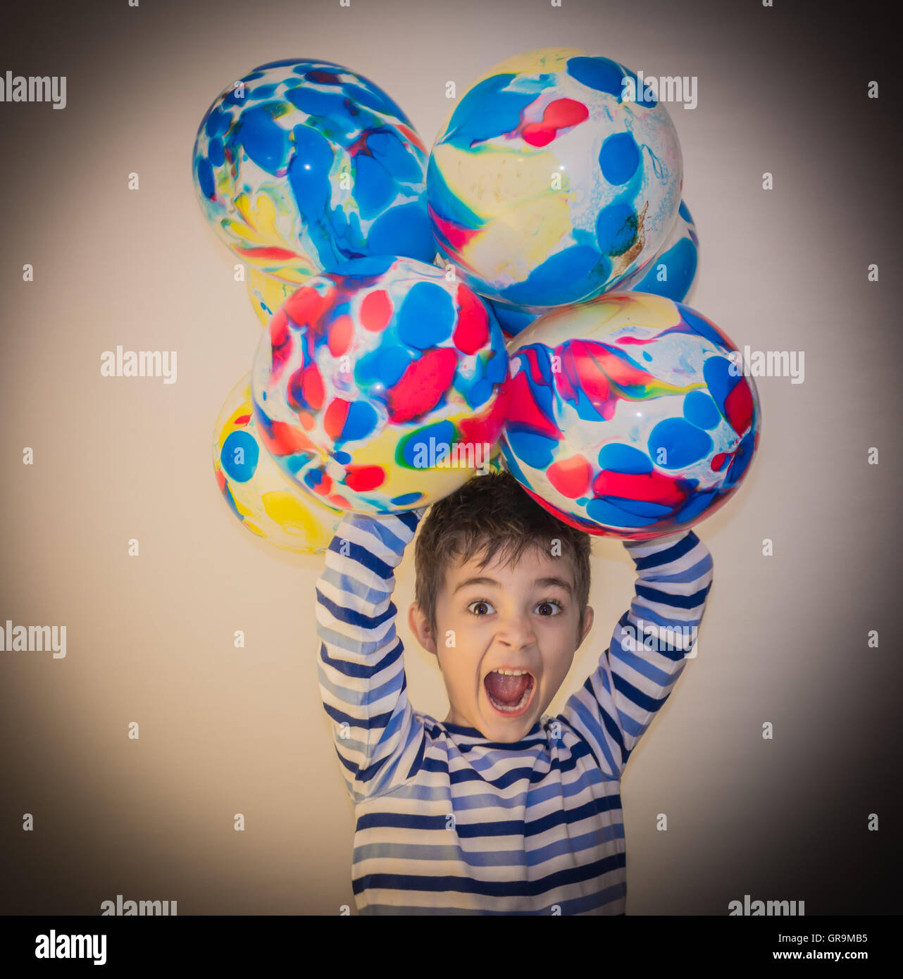 Furious Child Roars And Has Fun Doing Stock Photo - Alamy