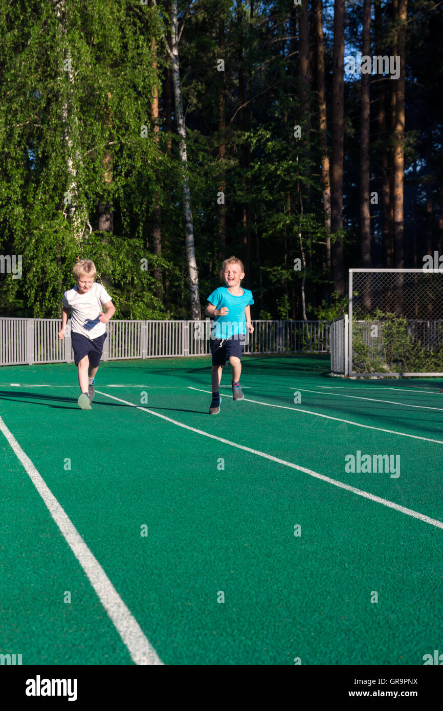 Children Running Track Stock Photos & Children Running Track Stock ...
