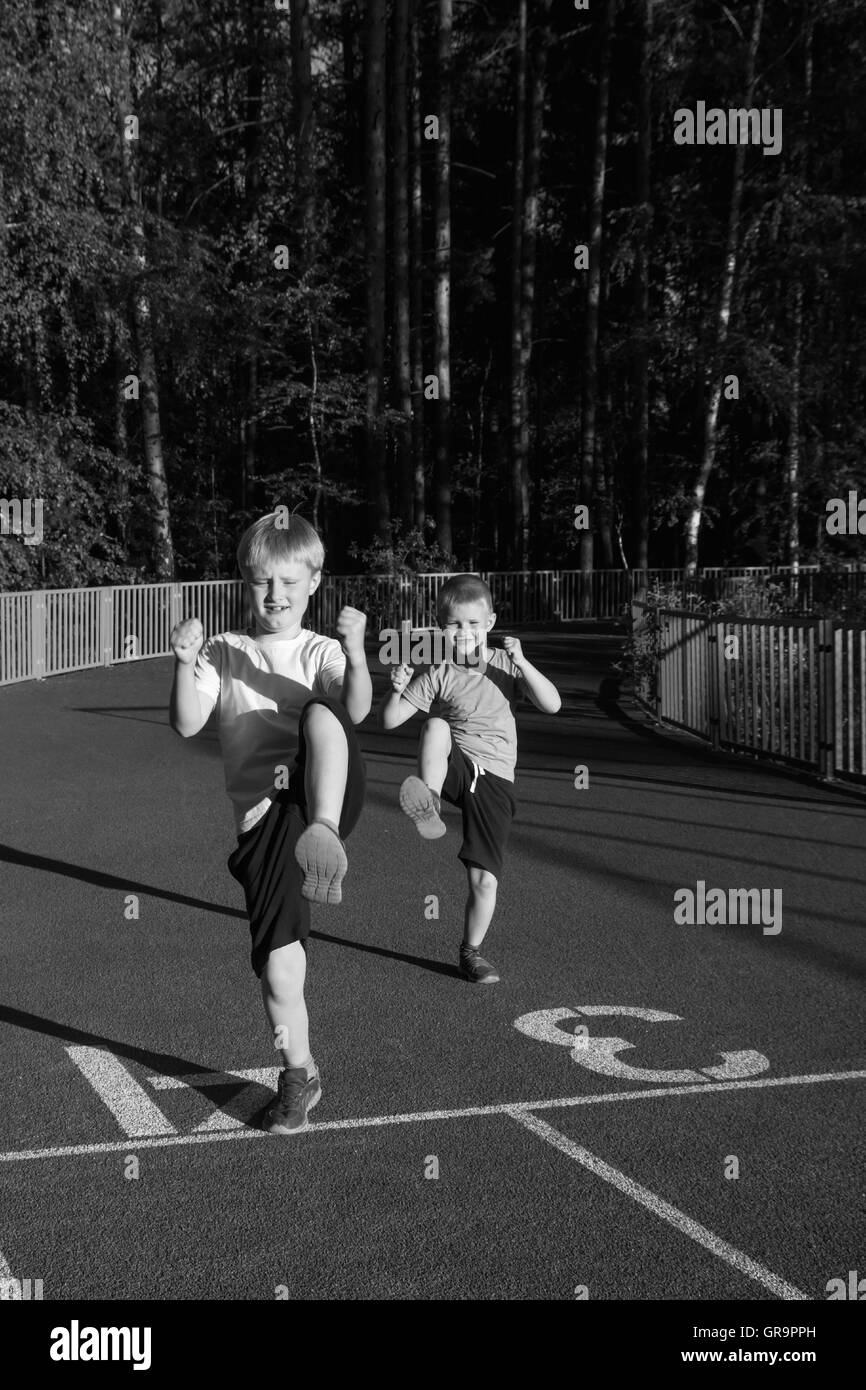 Children exercise training Black and White Stock Photos & Images - Alamy