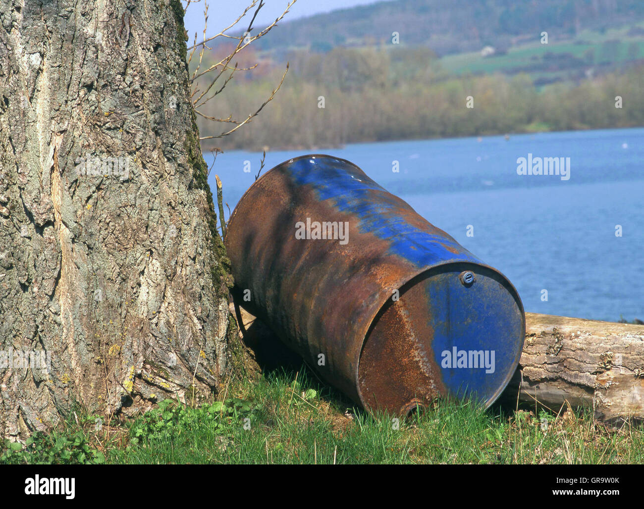 Old Oil Drum Located On A Lake Stock Photo - Alamy
