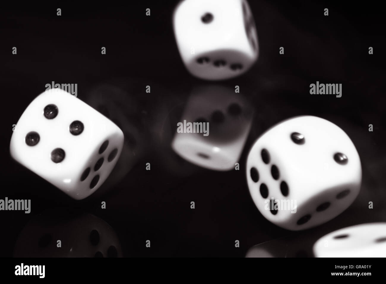 Dice In Motion Stock Photo - Alamy