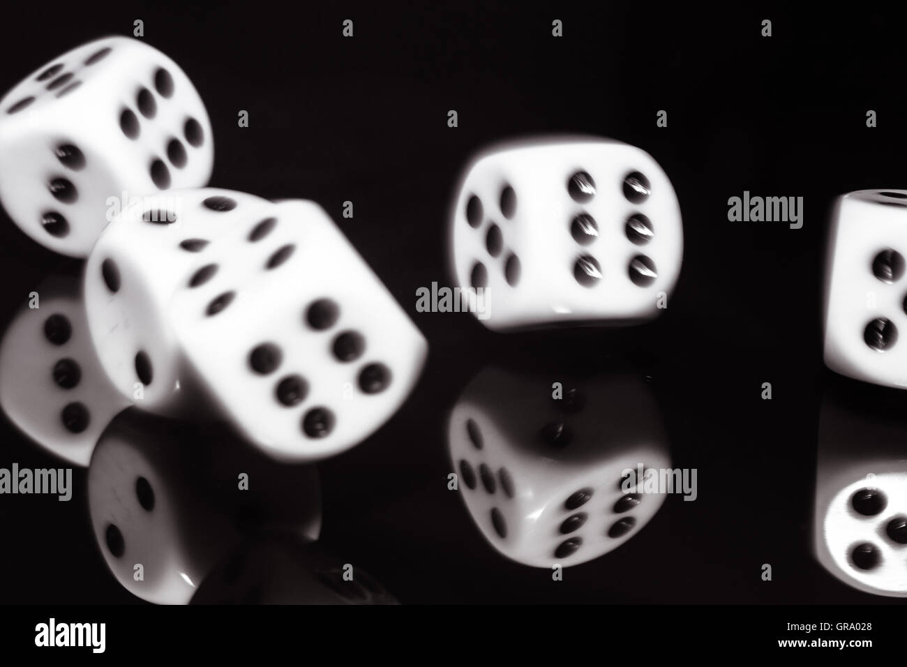 Dice In Motion Stock Photo - Alamy