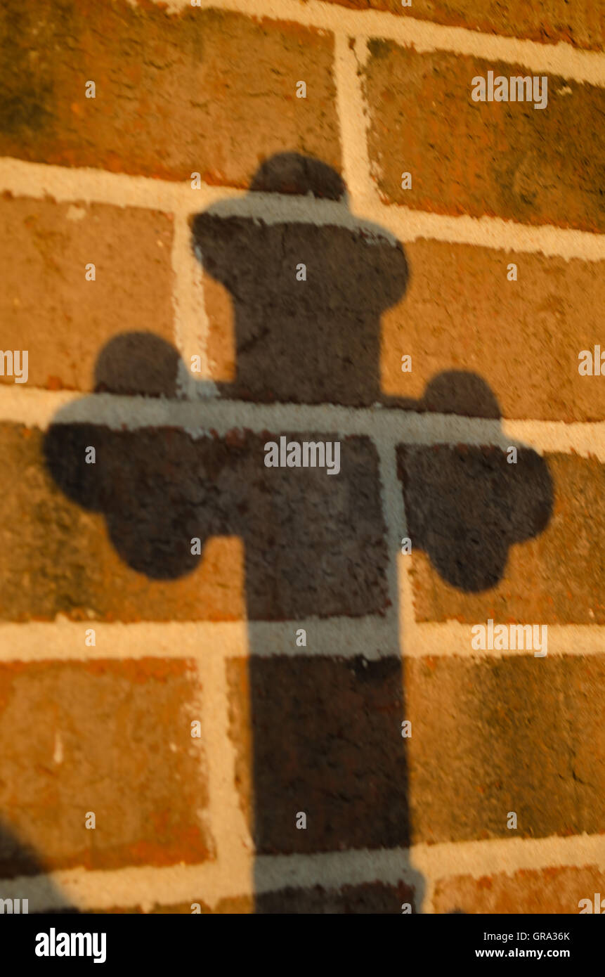 Religious cross and shadow hi-res stock photography and images - Alamy