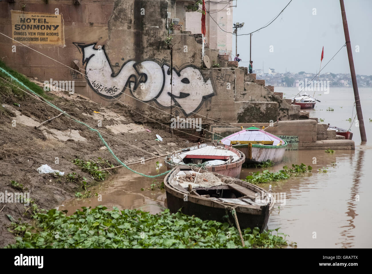Boats on the river Ganges in Monsoon, Varanasi, India Stock Photo - Alamy