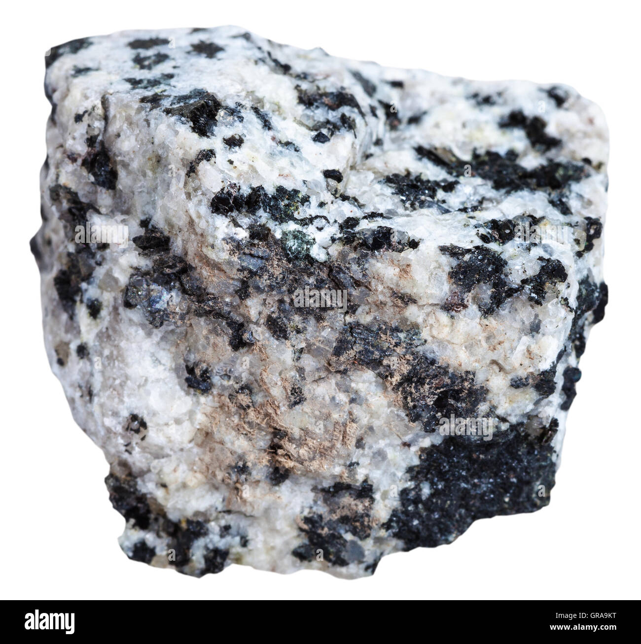 macro shooting of Igneous rock specimens - white and black granite mineral isolated on white ...