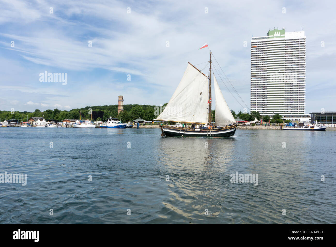 Sailing Boat On River Trave, The Old Lighthouse In The Back, Travemünde ...