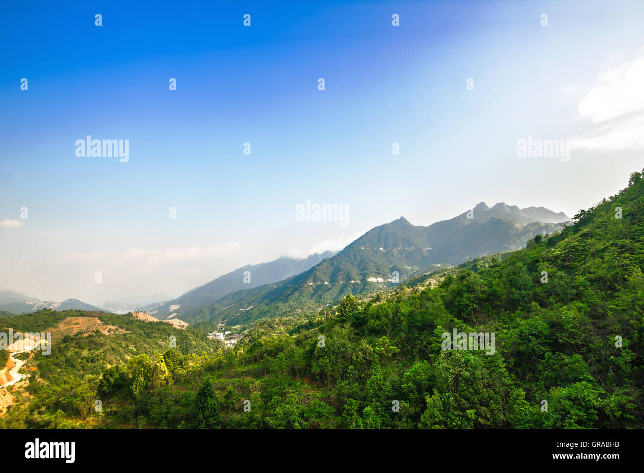 Blue sky and white clouds Castle Peak natural scenery Stock Photo - Alamy