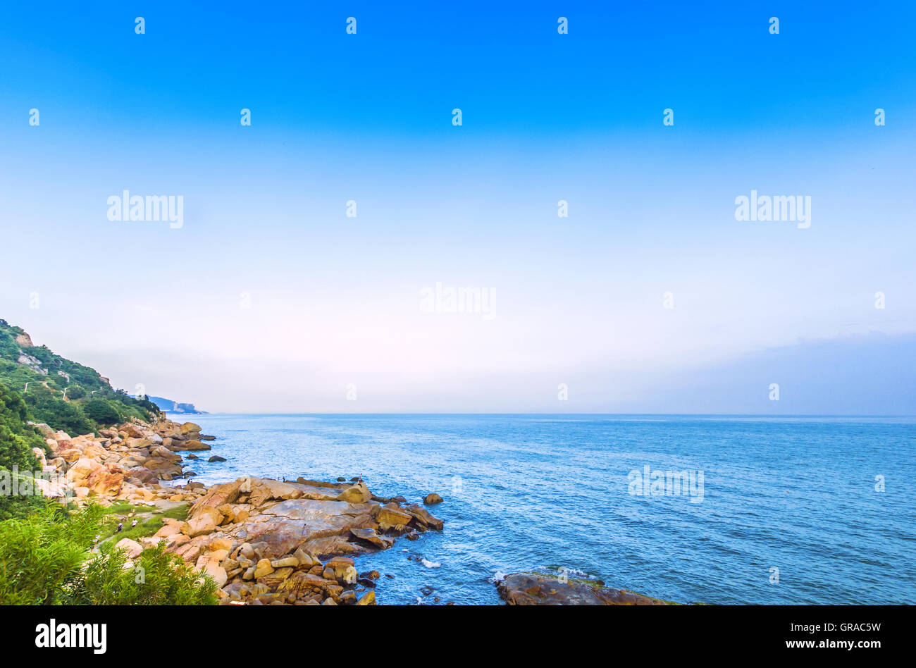 Blue rock beach scenery Xunliao Bay Stock Photo - Alamy