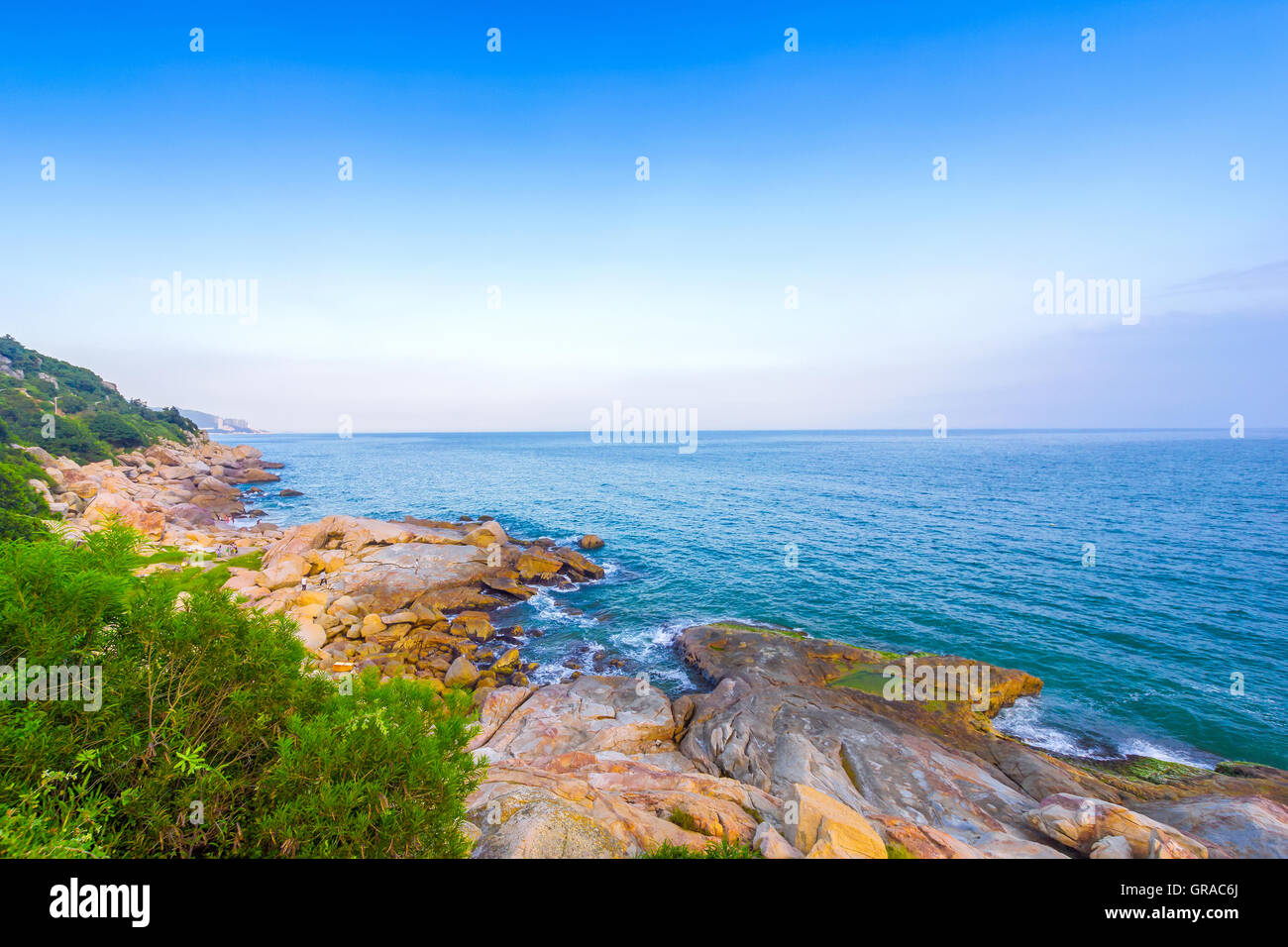 Blue rock beach scenery Xunliao Bay Stock Photo - Alamy