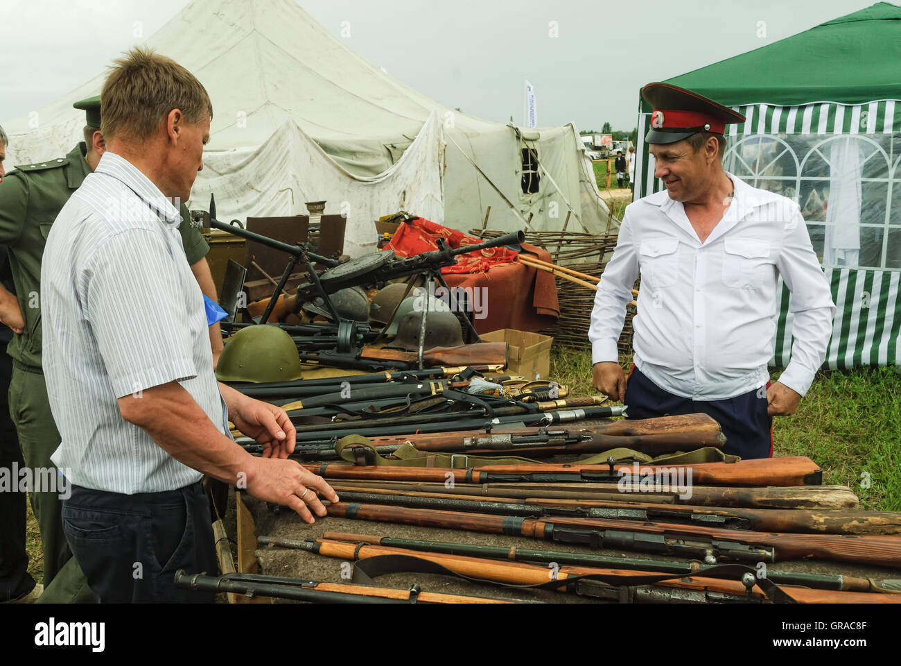 Senior cossack demonstrates rifles collection Stock Photo - Alamy