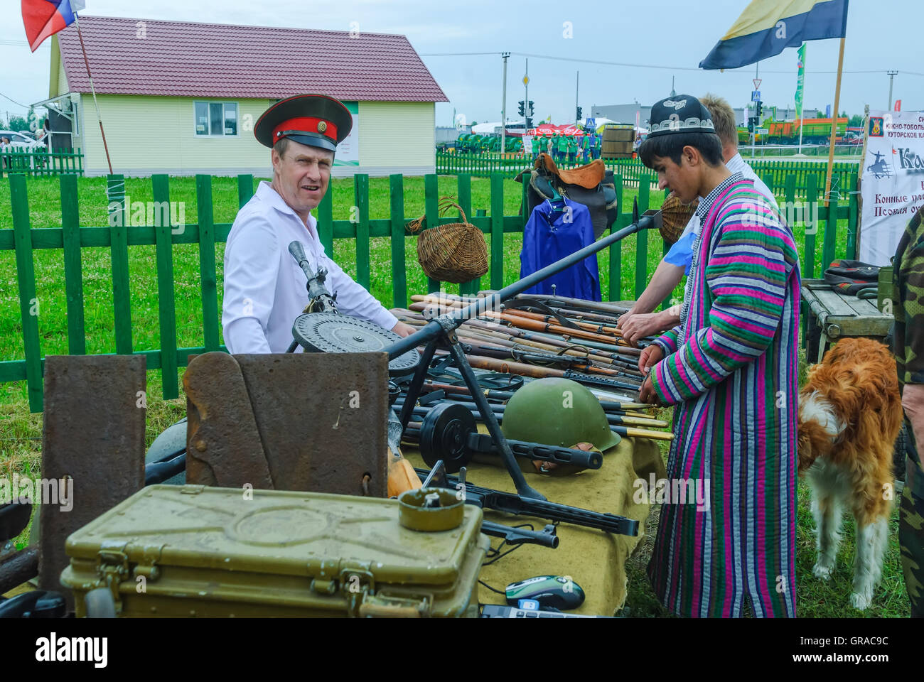 Senior cossack demonstrates rifles collection Stock Photo - Alamy