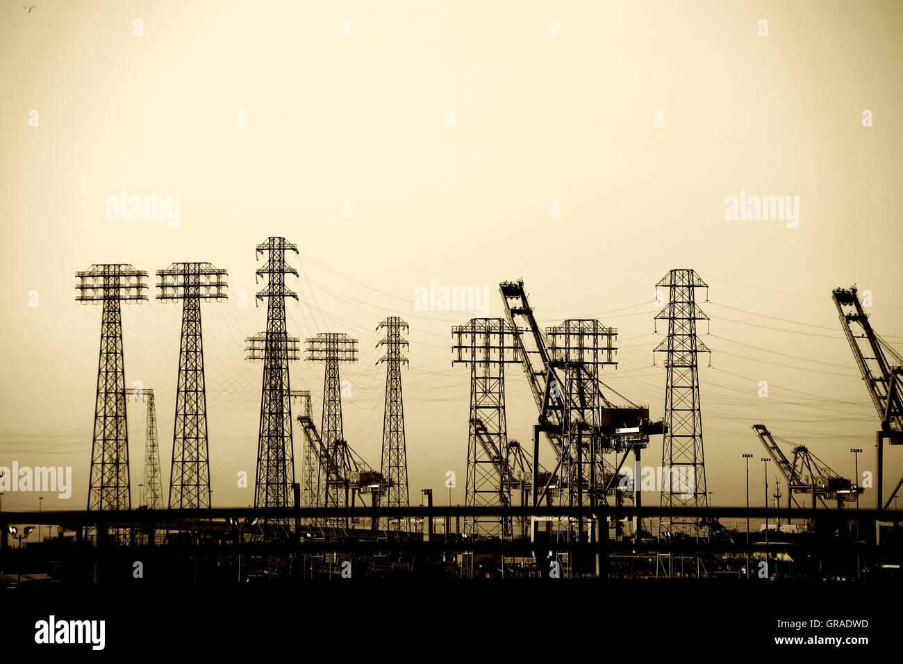 Electric Pylons In The Industrial Port Stock Photo - Alamy