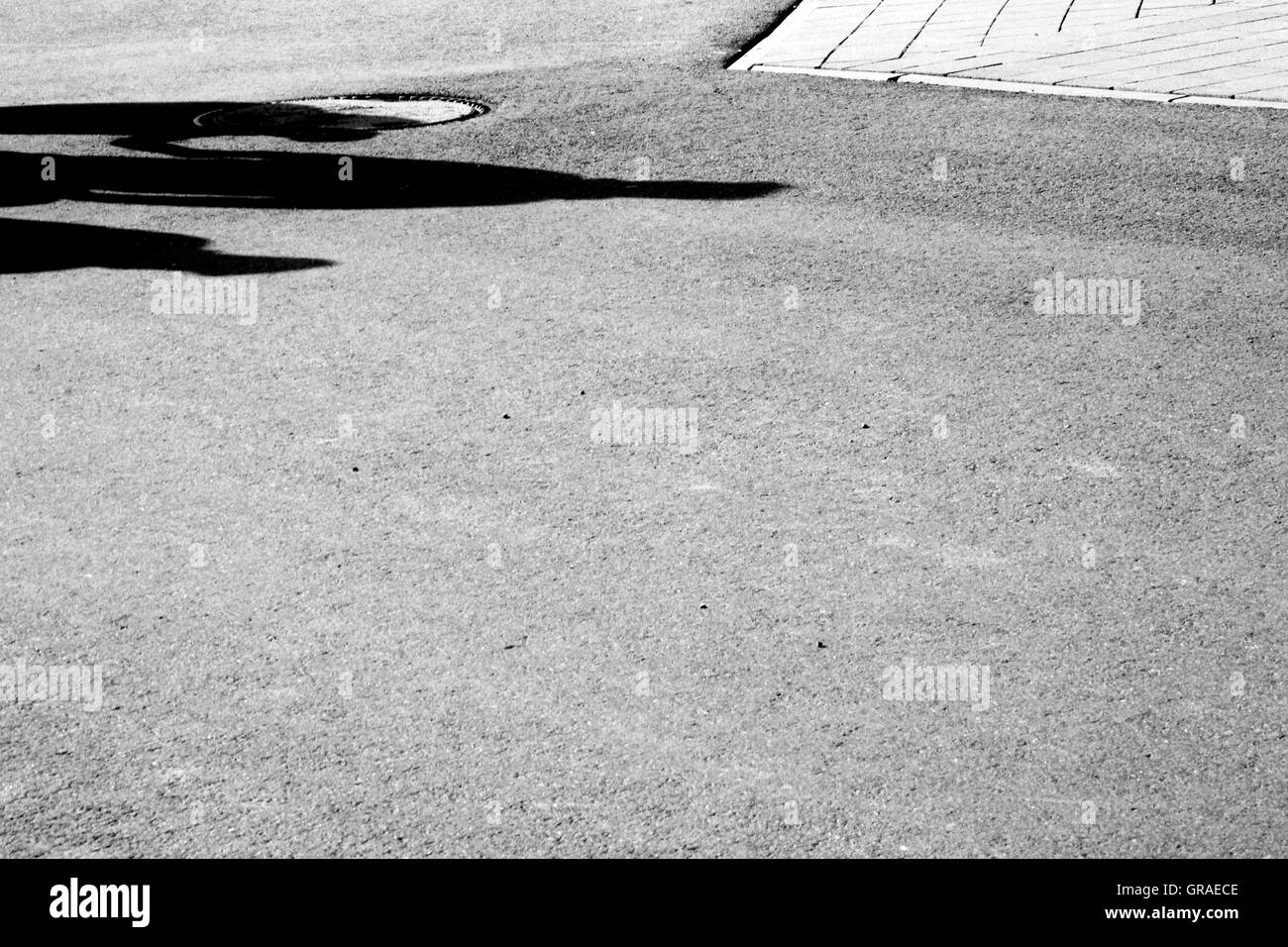 Shadow On The Asphalt Stock Photo - Alamy