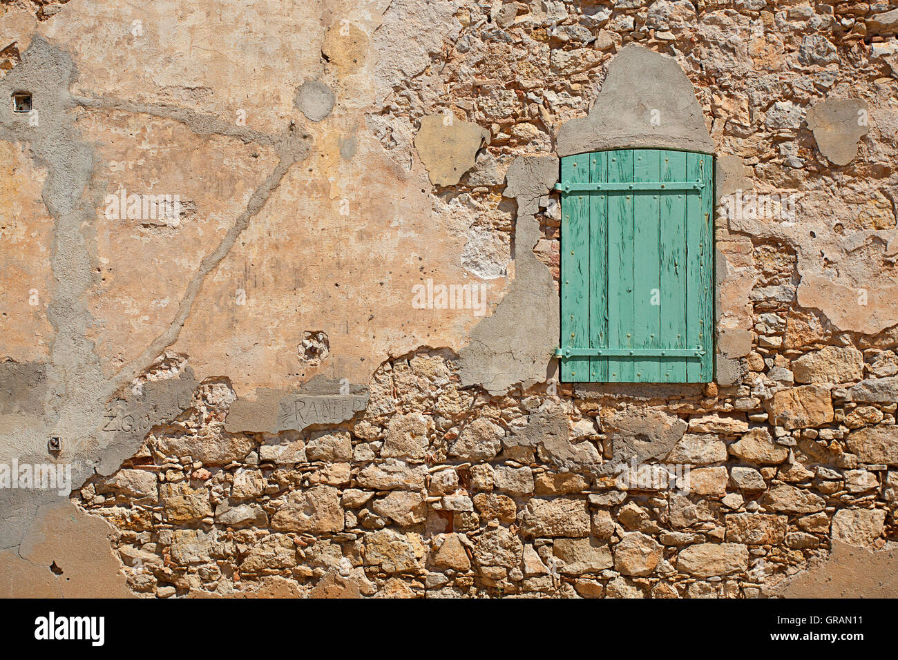 Quaint old wooden window shutter Stock Photo - Alamy